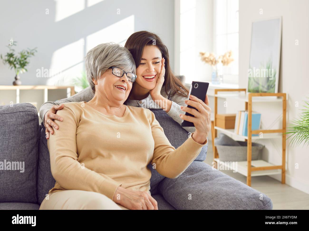 Mom talking on phone daughter hi-res stock photography and images - Alamy