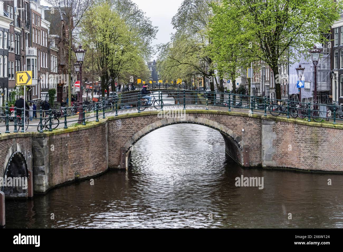 typical bridge crossing Keizersgracht water canal, Amsterdam ...