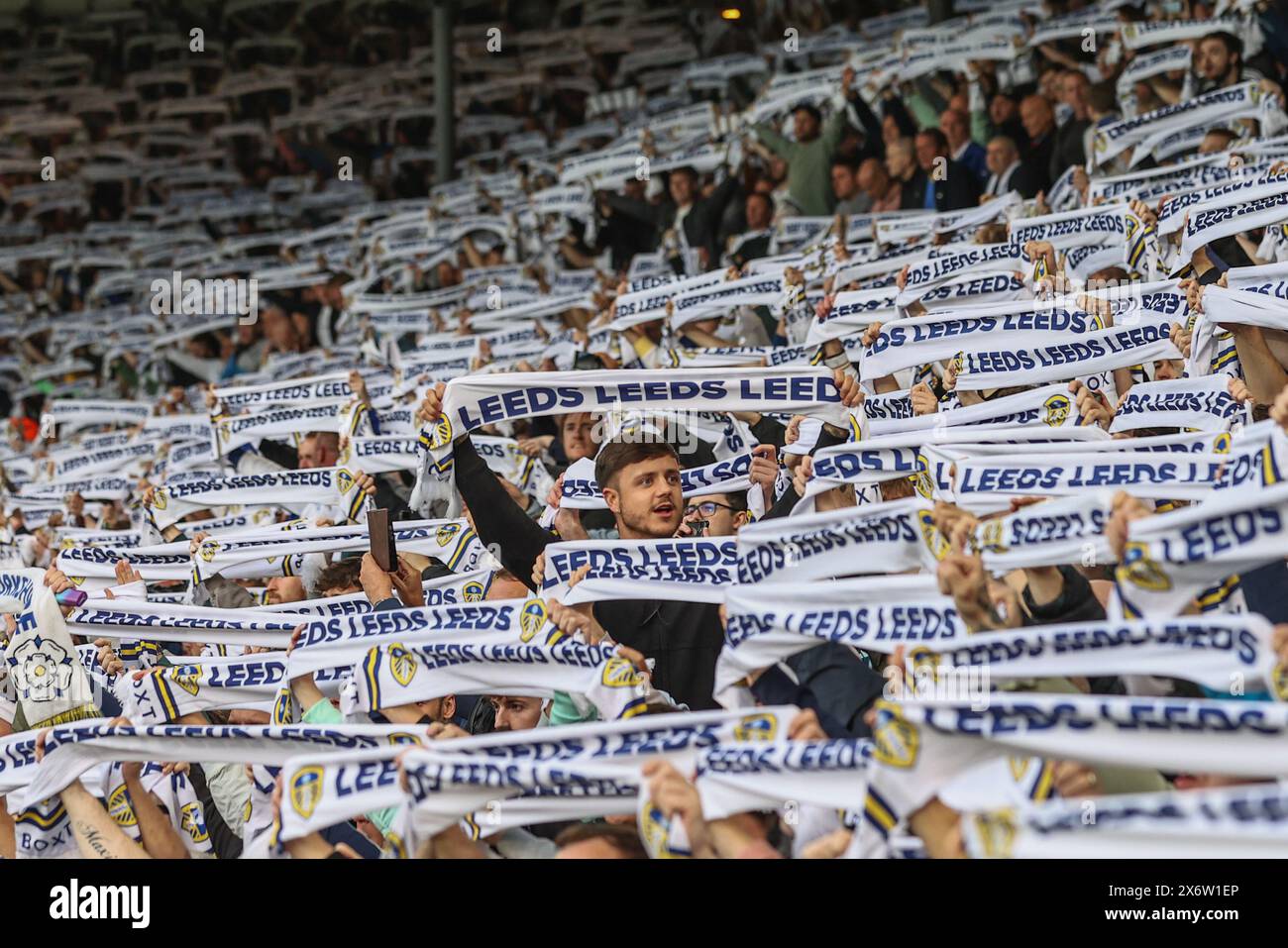 Leeds fans hold up their scarves before the game during the Sky Bet ...
