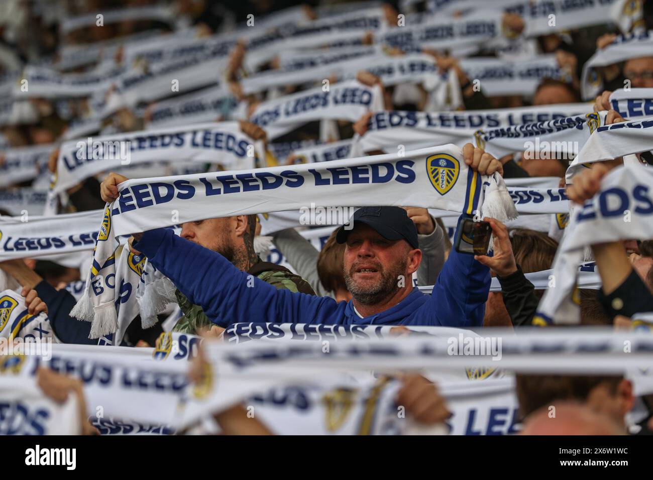 Leeds fans hold up their scarves before the game during the Sky Bet ...