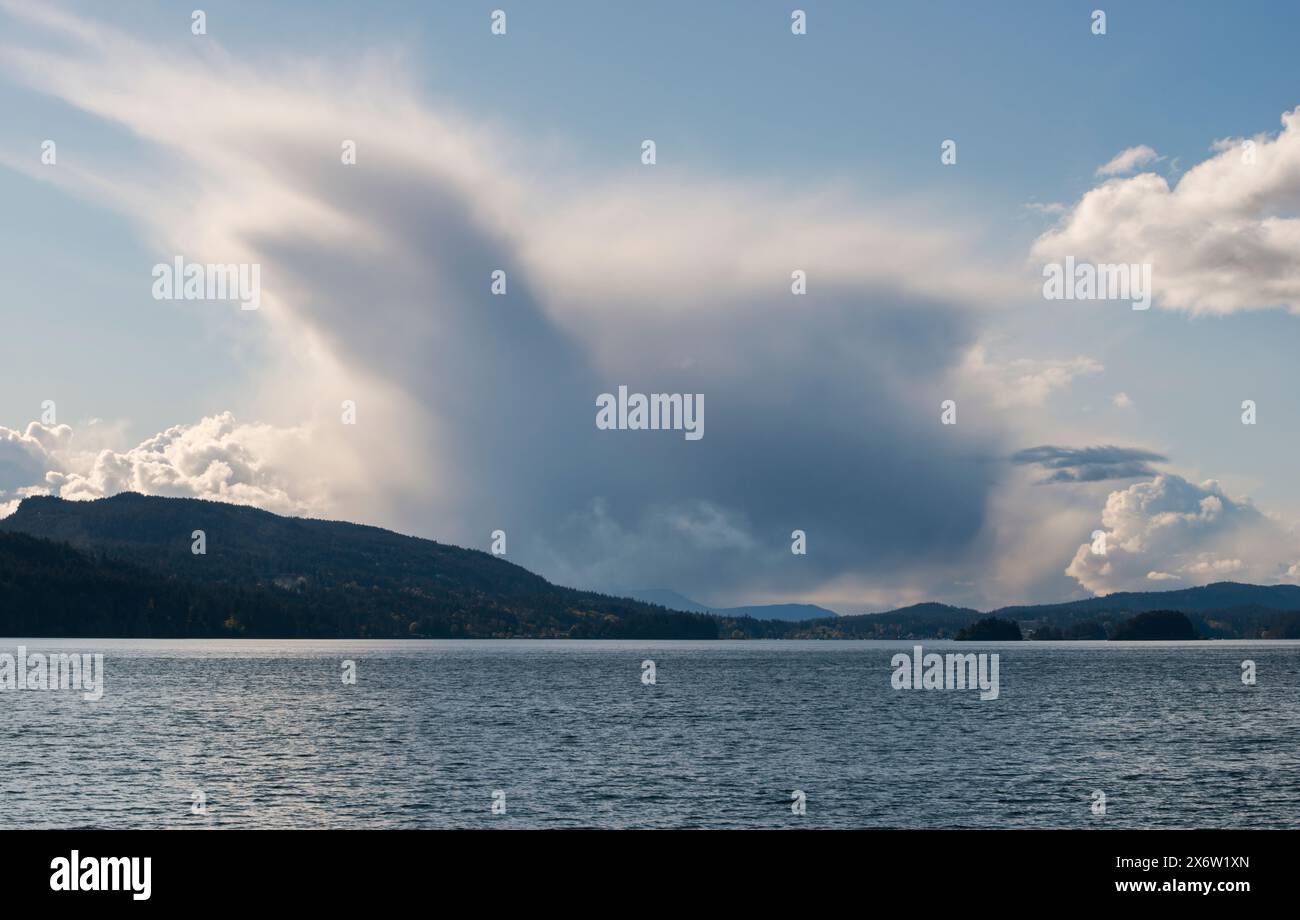 Dramatic spring storm clouds above the coastal mountain landscape in ...