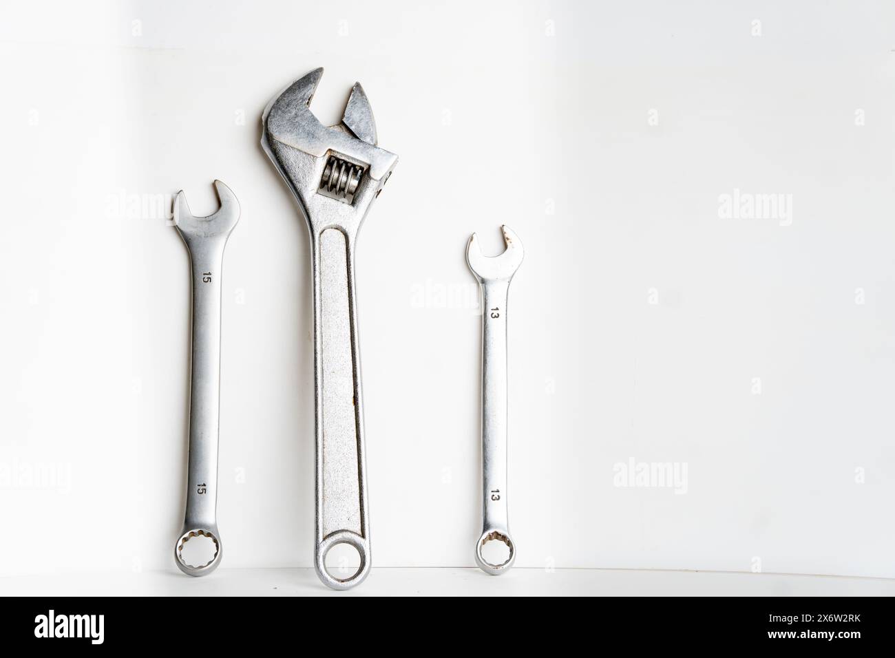 plumbing repair tool kit on white background, screwdriver, adjustable ...