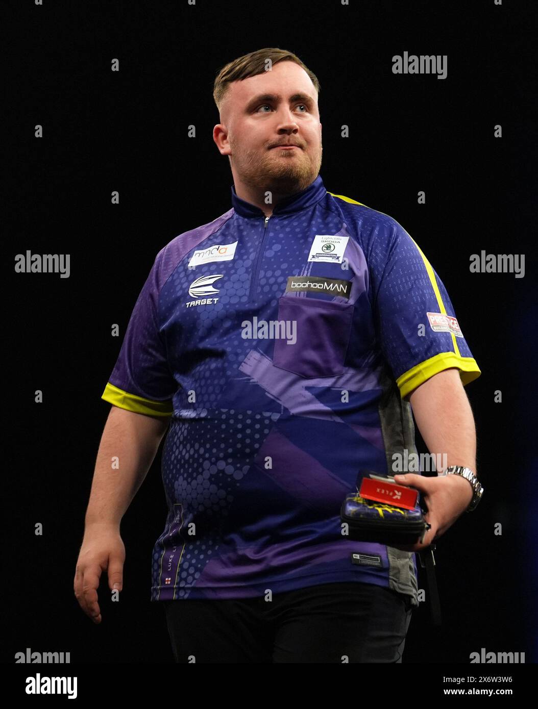 Luke Littler during his match against Peter Wright (not pictured) on ...