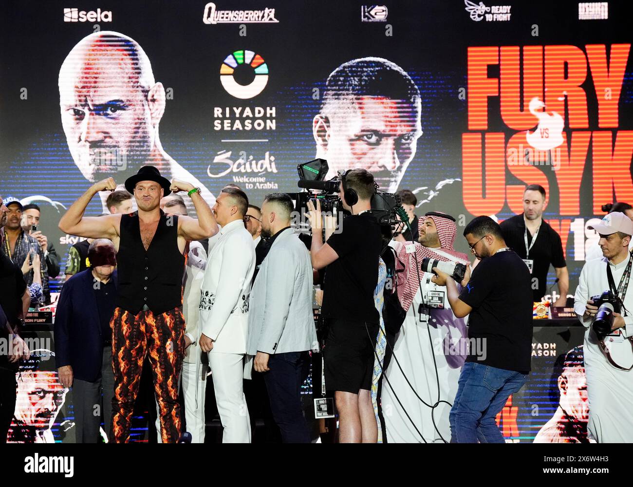 Tyson Fury (left) and Oleksandr Usyk during a press conference at BLVD ...