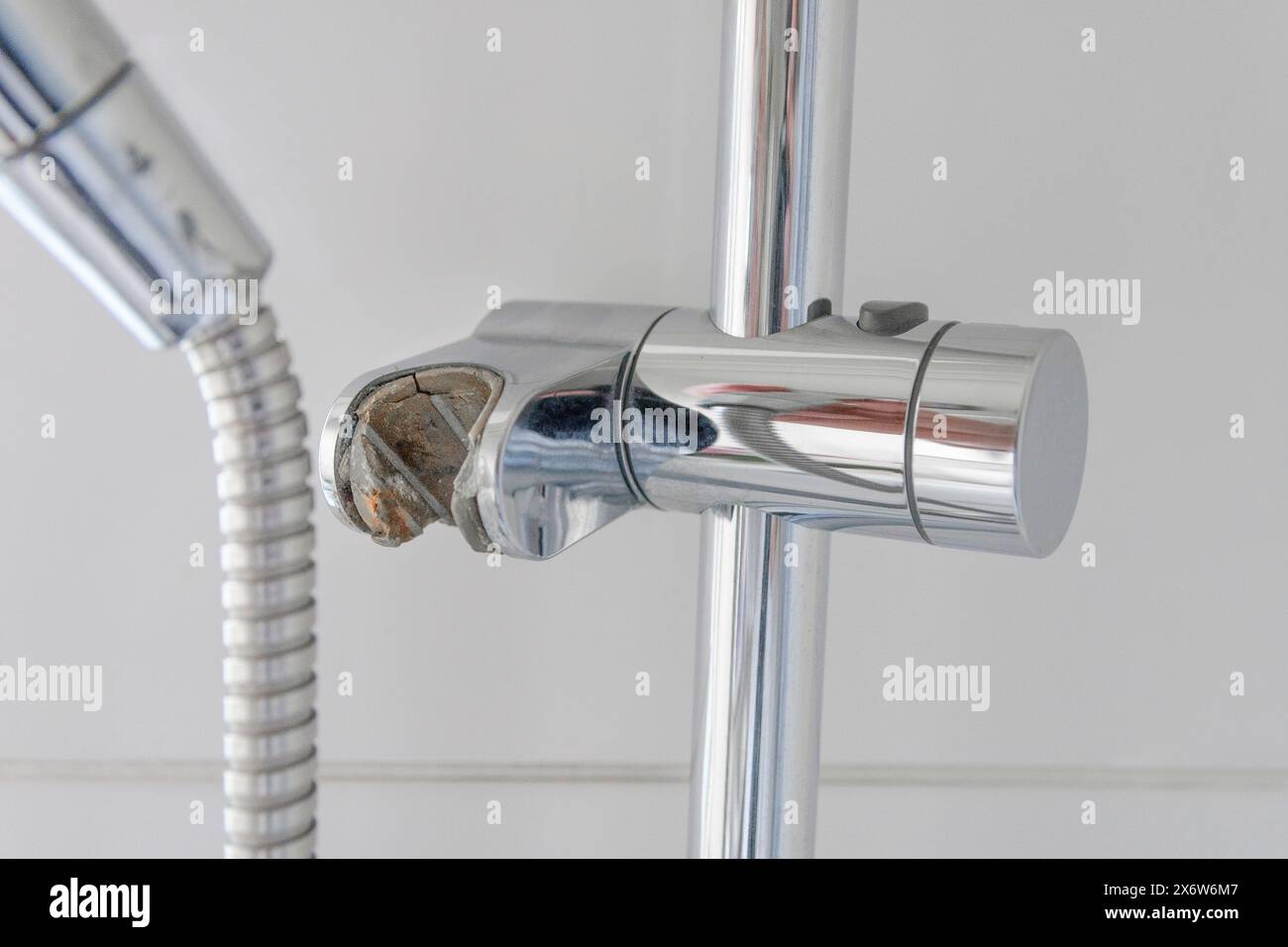 Shower holder. old mounting rubber. The shower handle needs to be ...