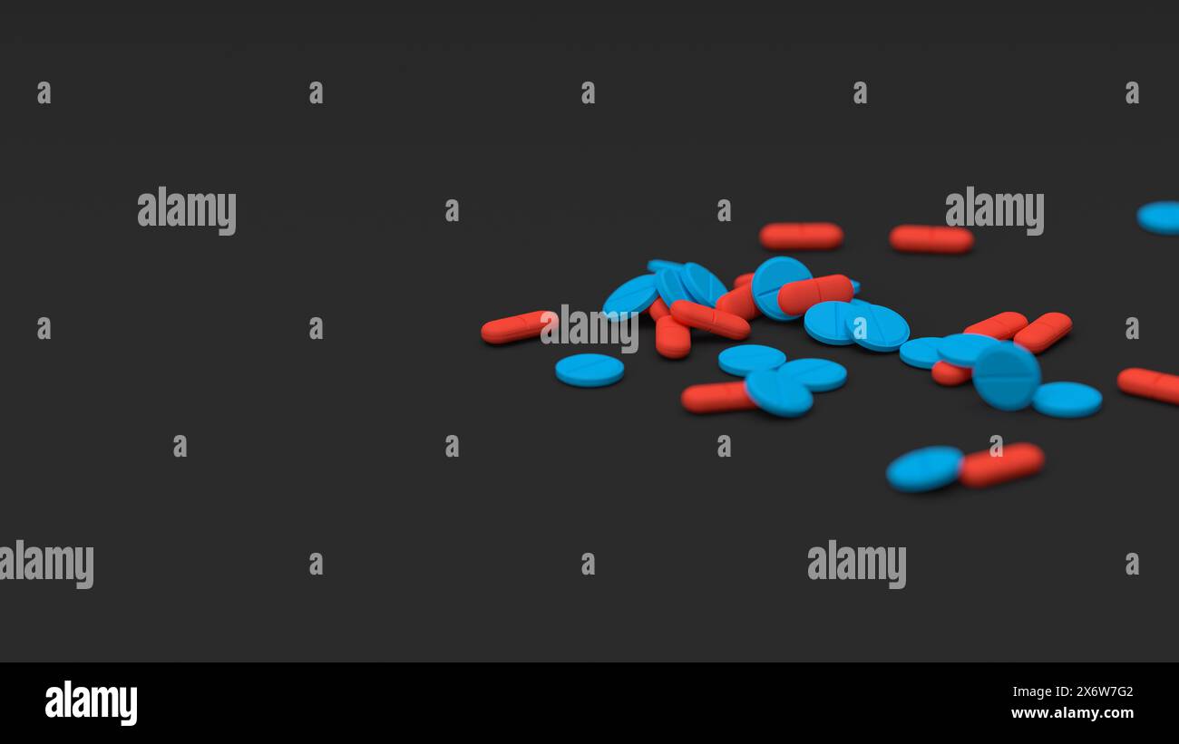 Blue red tablets on black background with shallow DOF. Drugs, pills ...