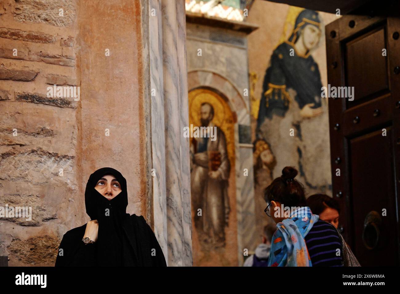 A veiled woman seen outside the Inner Narthex. From 6 May 2024, The ...