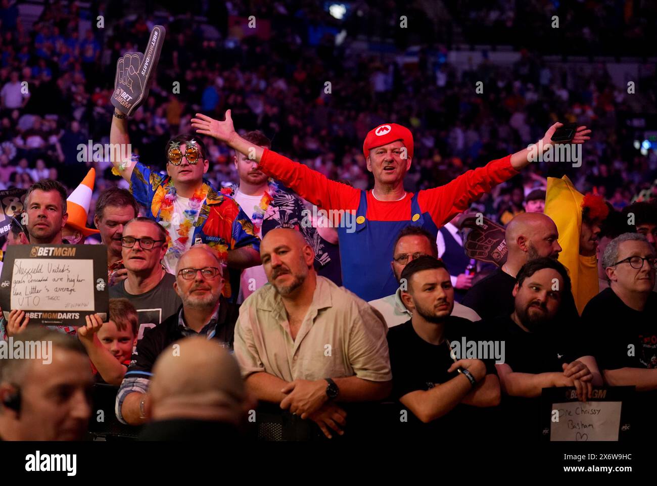 People in the crowd wearing fancy dress during night sixteen of the ...