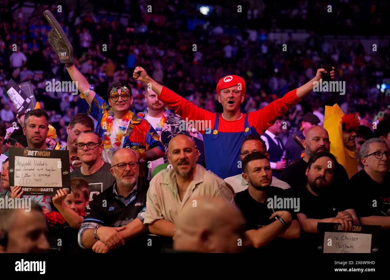 People in the crowd wearing fancy dress during night sixteen of the ...