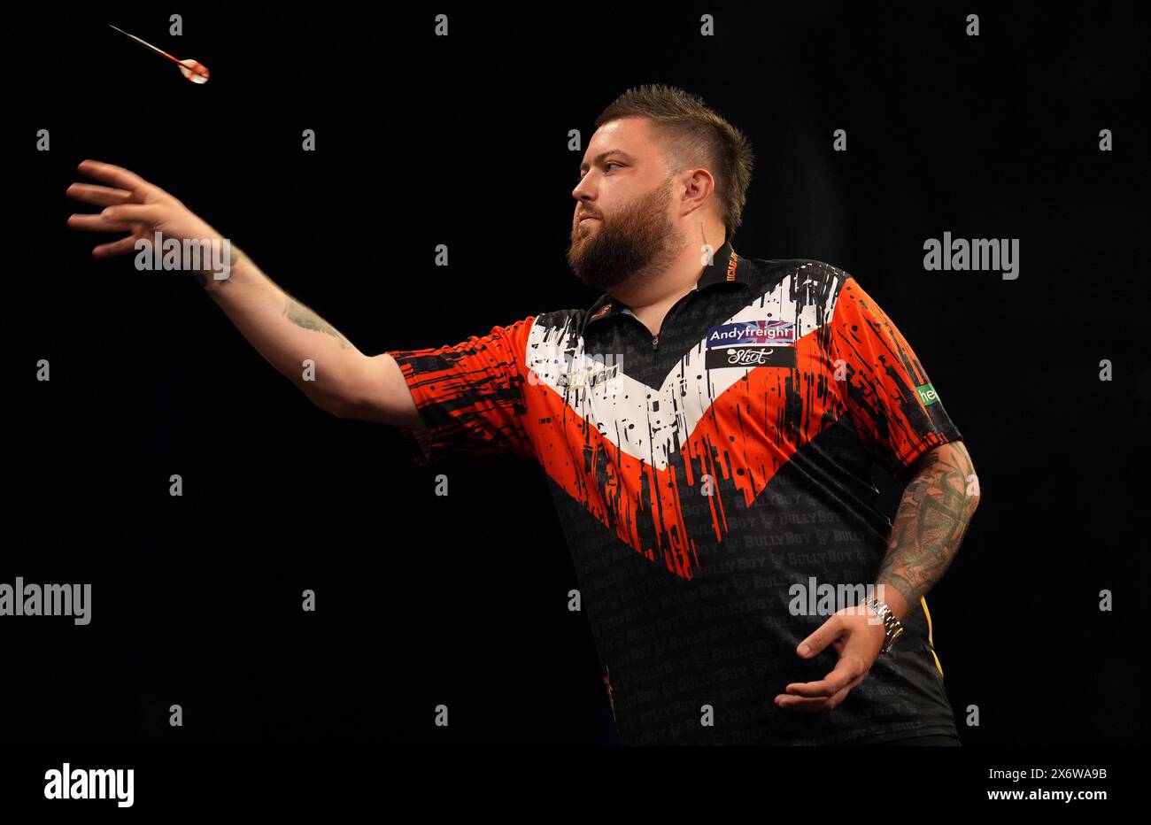 Michael Smith in action during the semi-match match against Luke ...