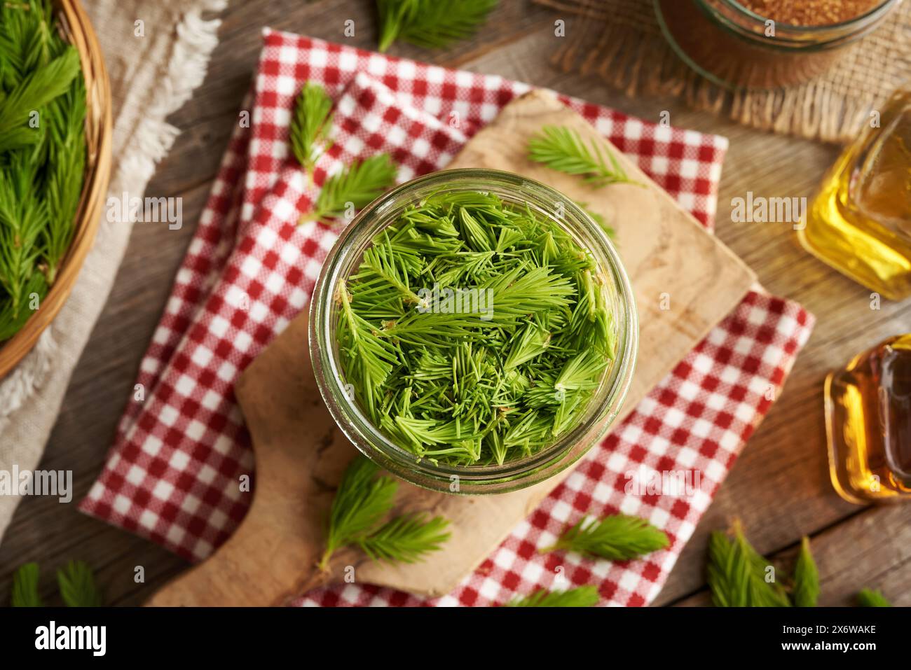 Preparation of homemade herbal syrup from fresh young spruce tips ...