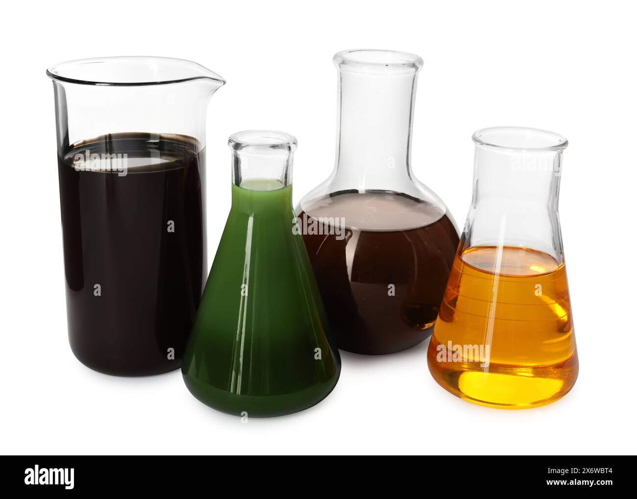 Beaker and flasks with different types of oil isolated on white Stock ...