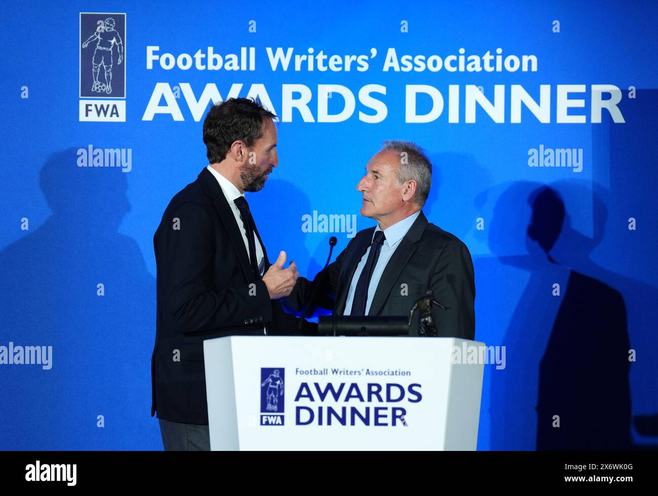 England manager Gareth Southgate (left) presenting the FWA Men's ...