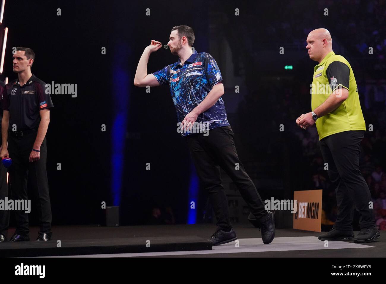 Sheffield, UK. 16th May, 2024. Luke Humphries throws Michael van Gerwen ...