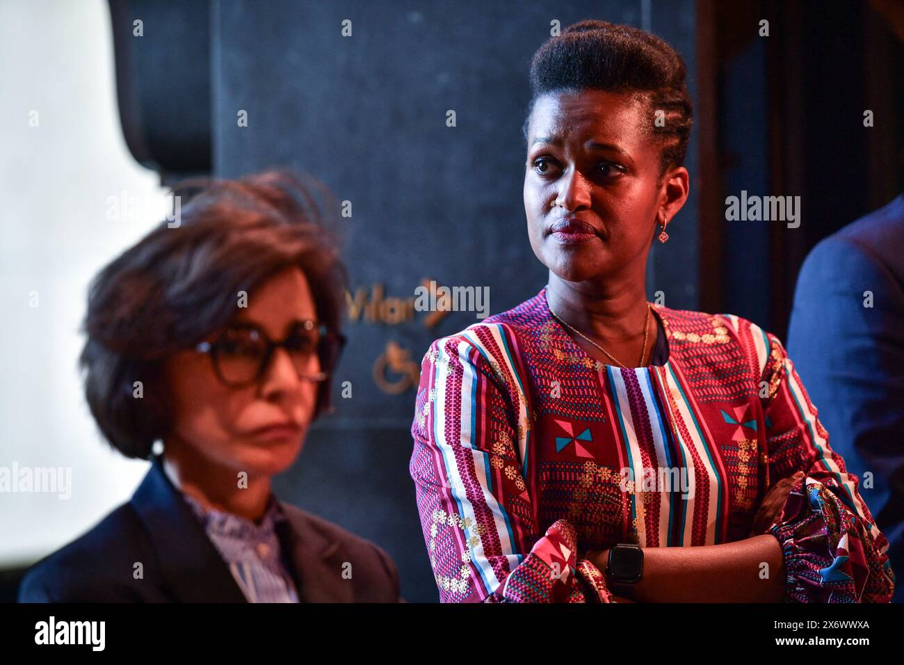 Minister for Youth and the Arts of Rwanda, Sandrine Umutoni looks on ...