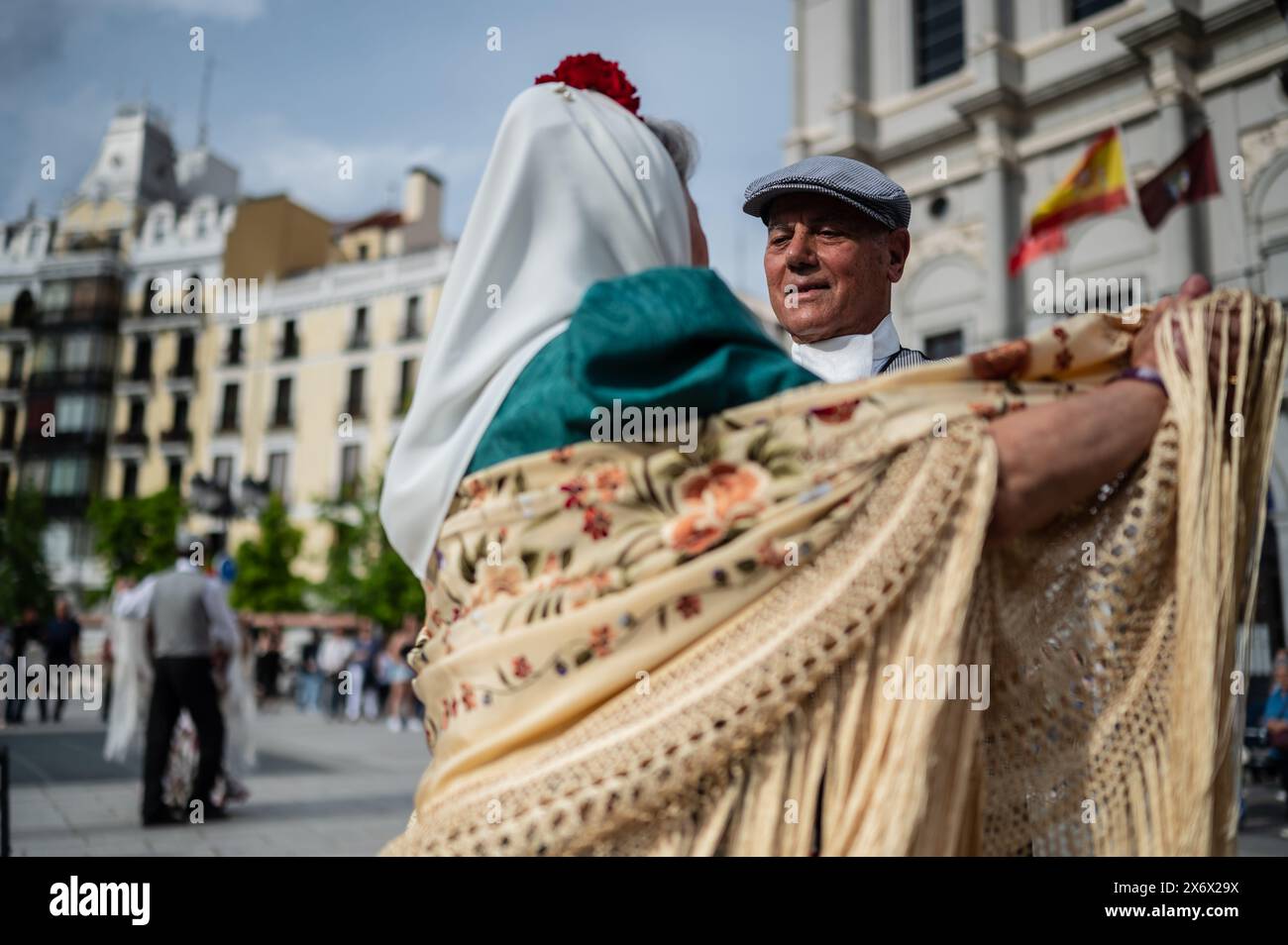 Mature dancers dance the traditional chotis during the San Isidro ...