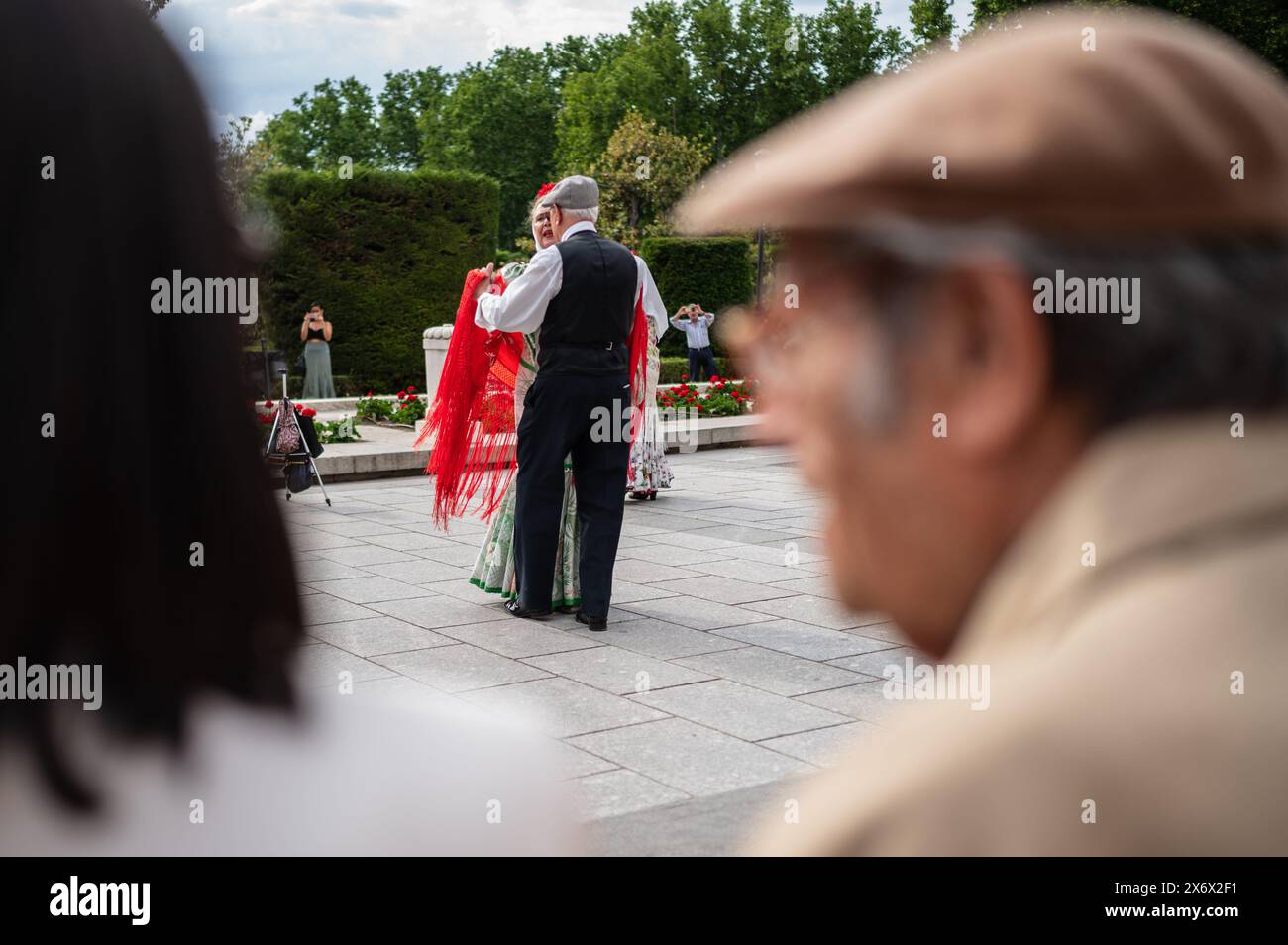 Mature dancers dance the traditional chotis during the San Isidro ...