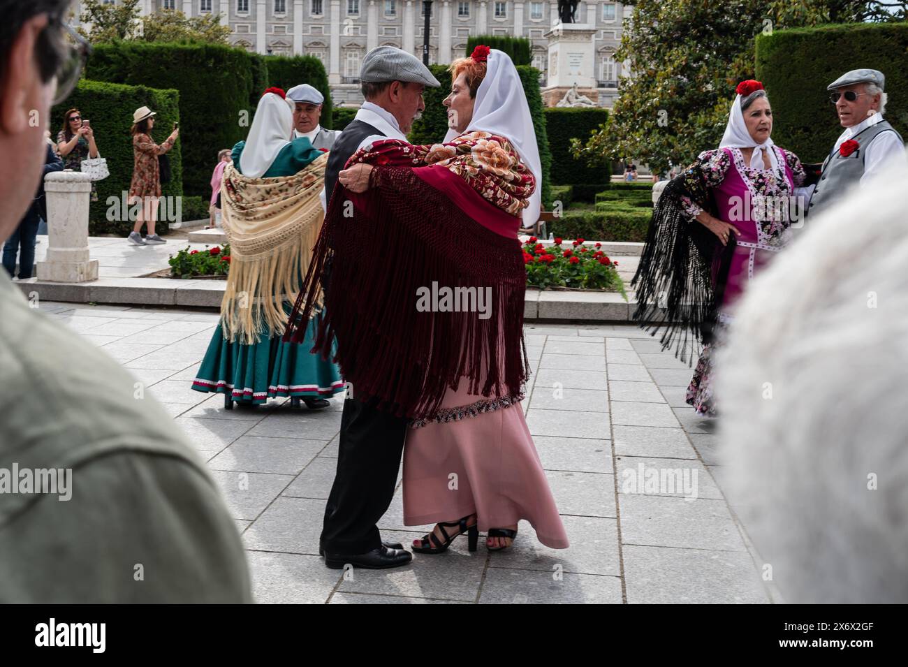 Mature dancers dance the traditional chotis during the San Isidro ...