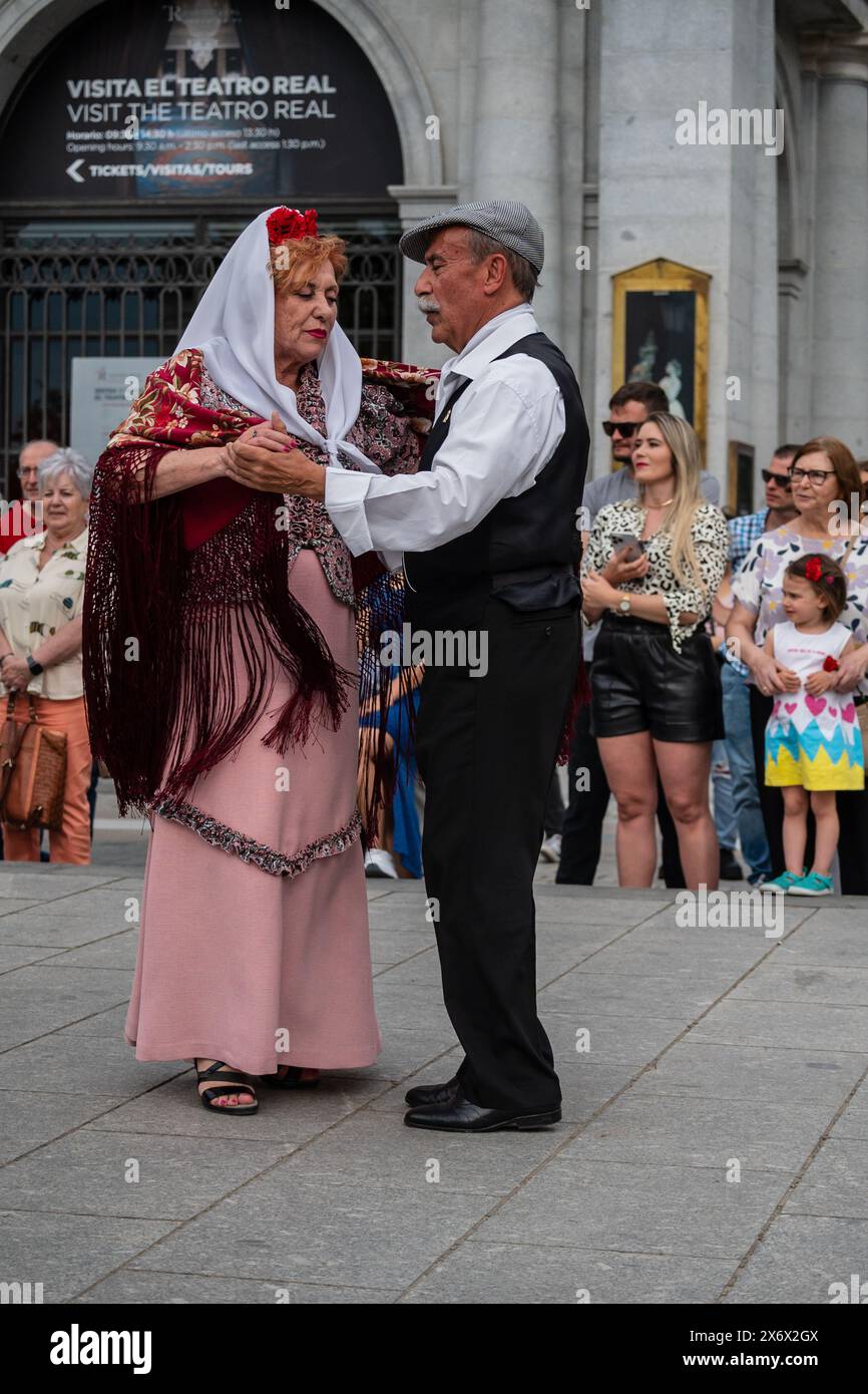 Mature dancers dance the traditional chotis during the San Isidro ...