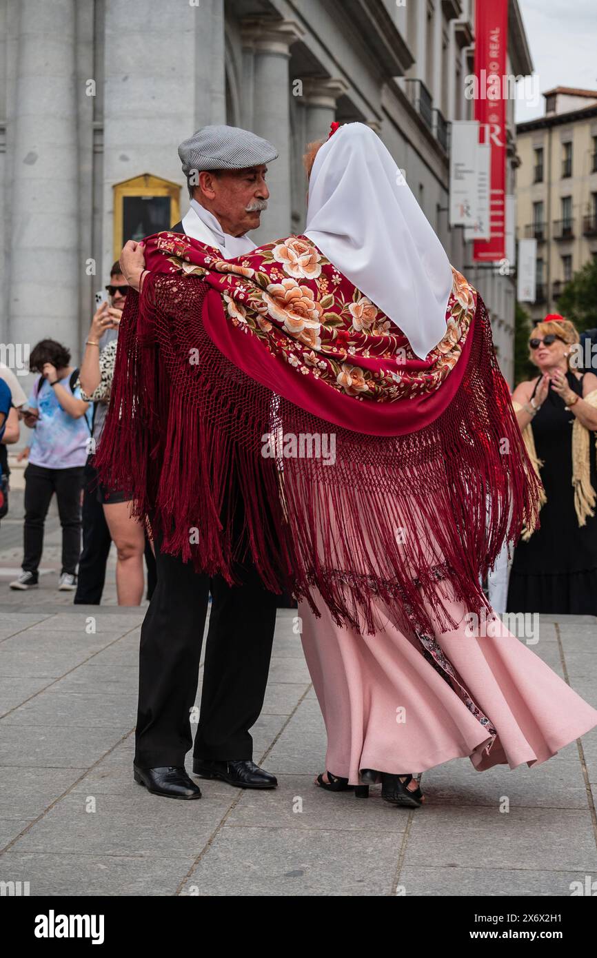 Mature dancers dance the traditional chotis during the San Isidro ...