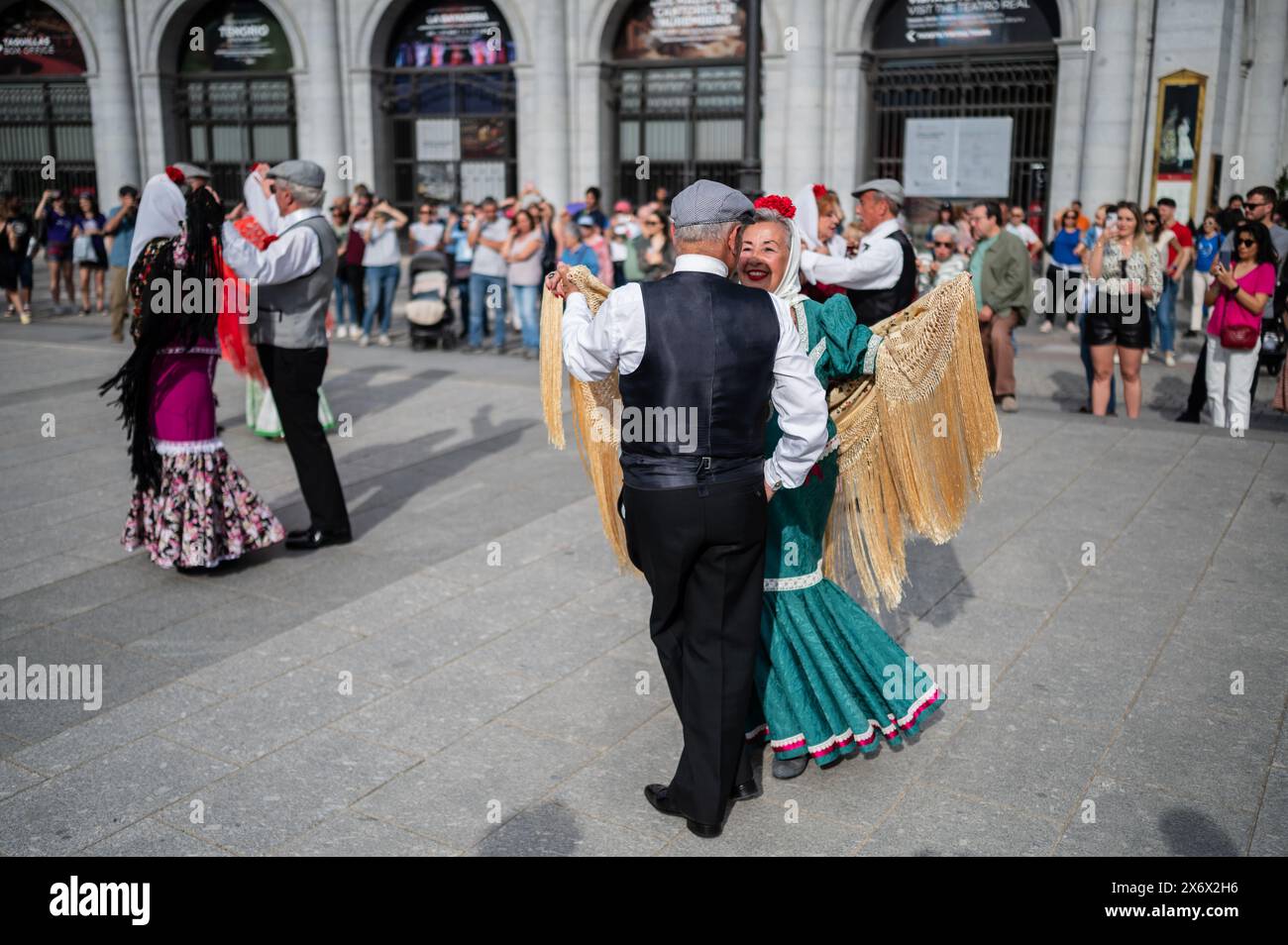 Mature dancers dance the traditional chotis during the San Isidro ...