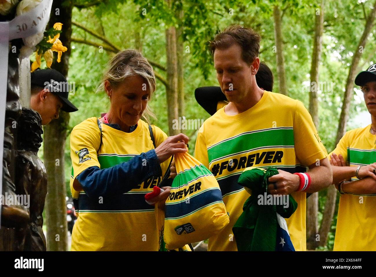 Imola, Italy. May 16, 2024. Sebastian Vettel in front of Ayrton Senna ...