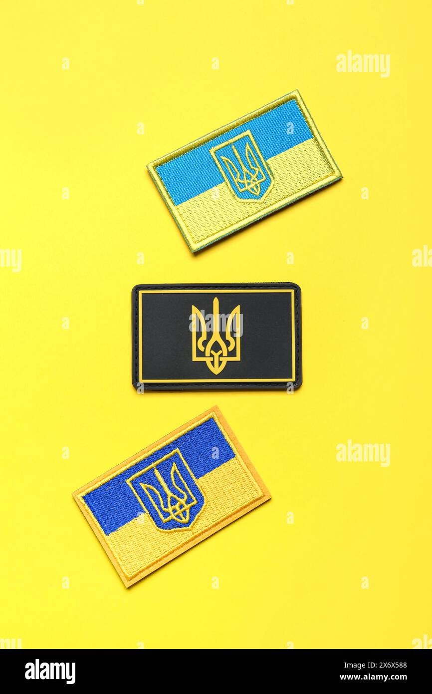 Different military badges of Ukrainian army with trident on yellow ...