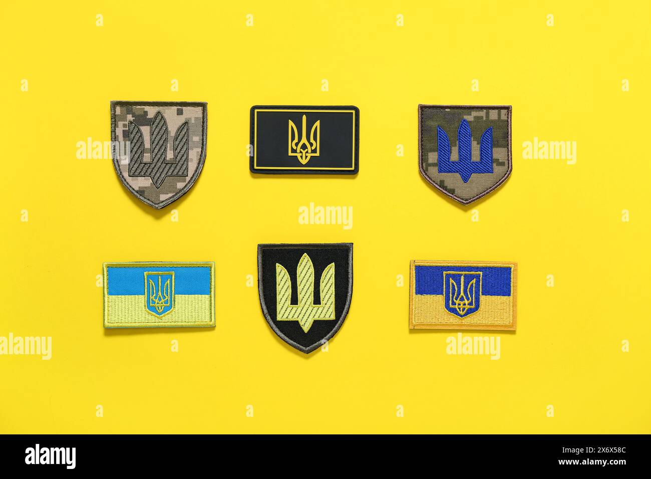Different military badges of Ukrainian army with trident on yellow ...