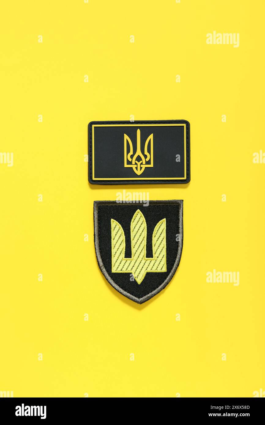Different military badges of Ukrainian army with trident on yellow ...