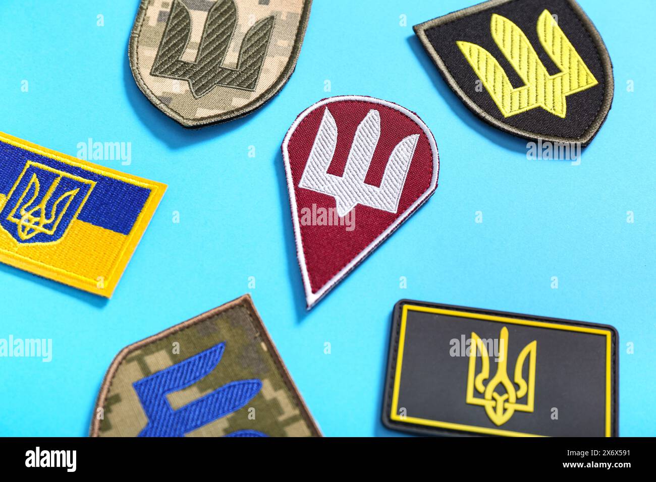 Different military badges of Ukrainian army with trident on blue ...