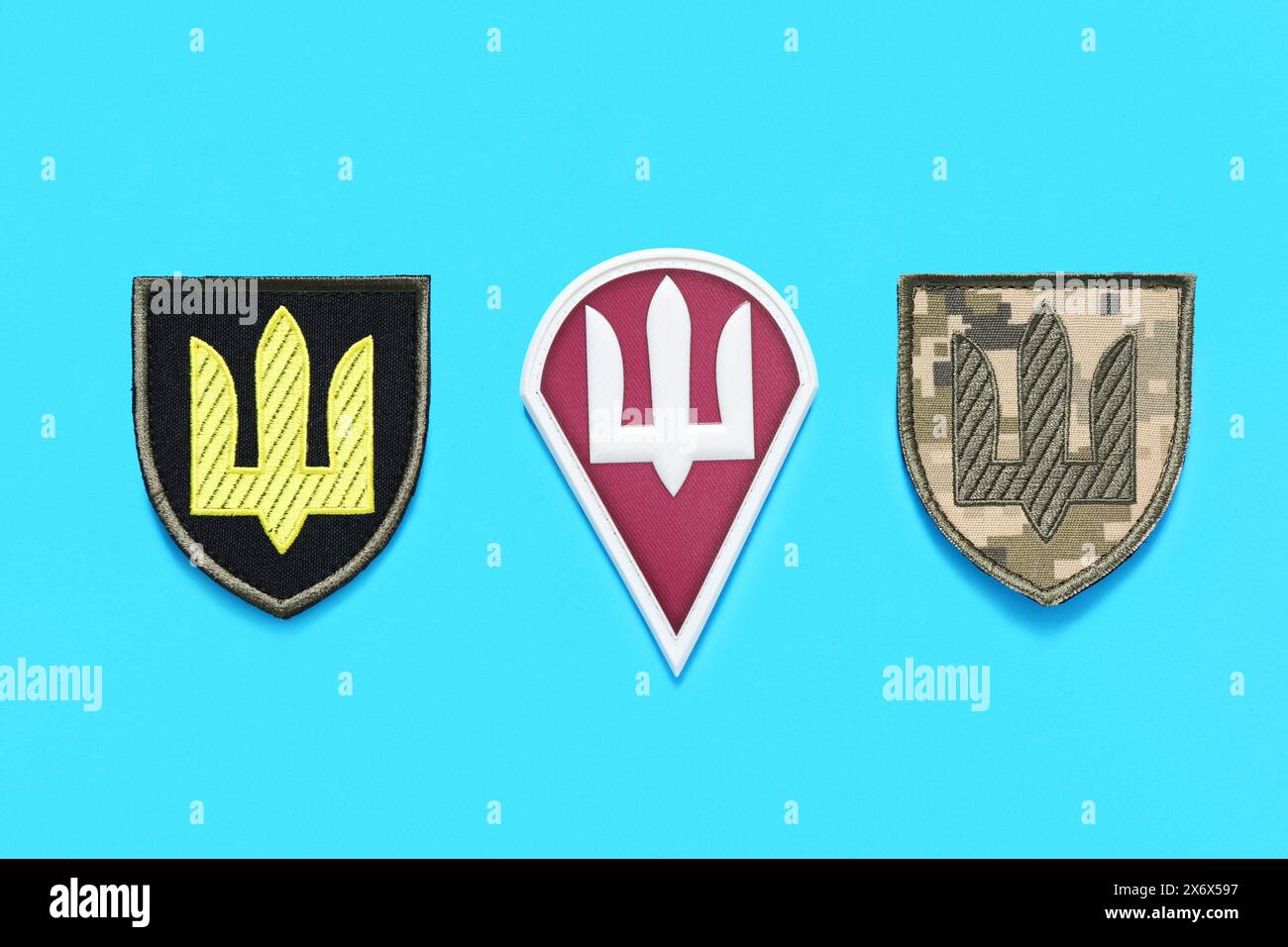 Different military badges of Ukrainian army with trident on blue ...