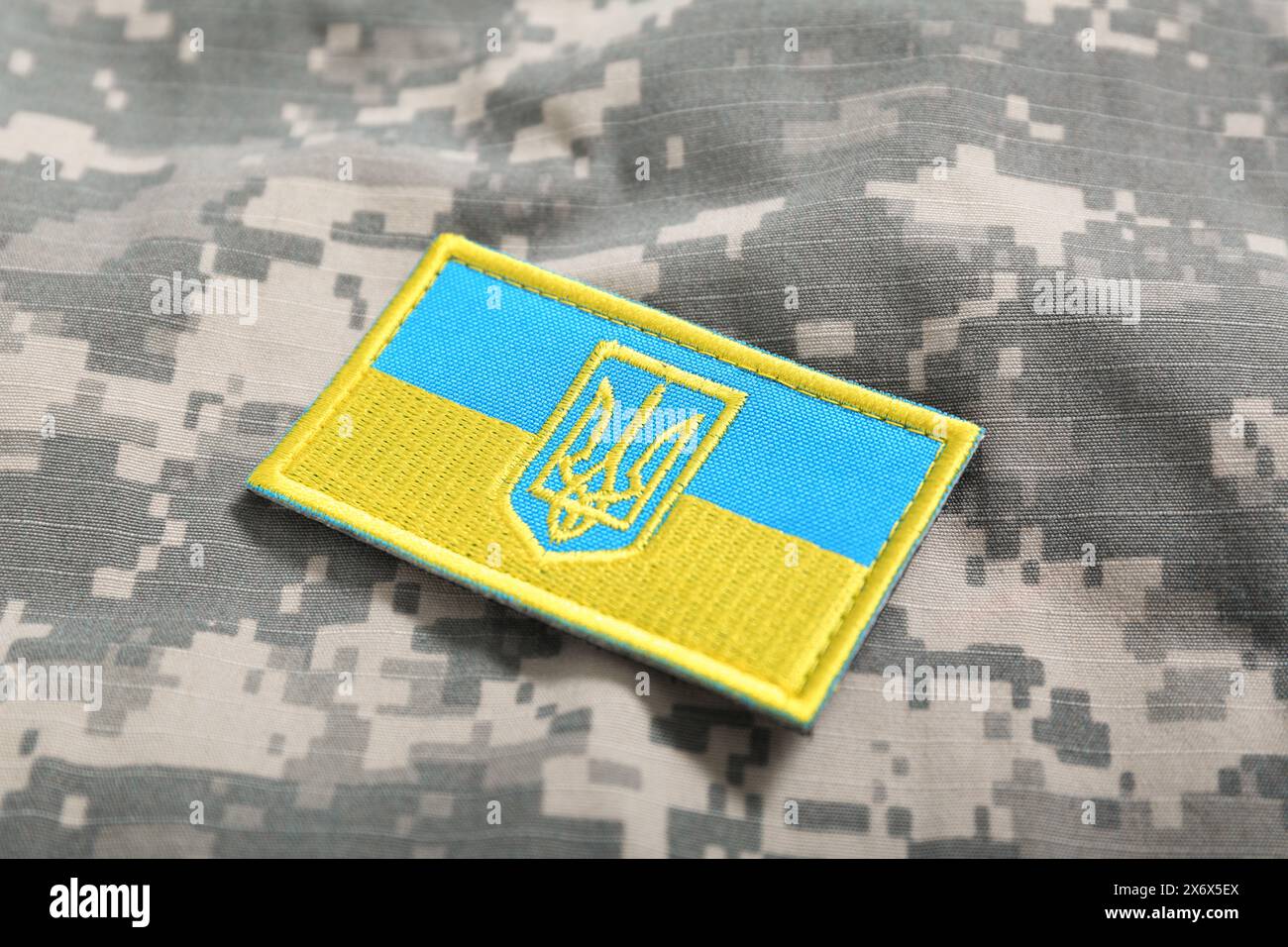 Military badge of Ukrainian army with trident and Ukraine flag on ...