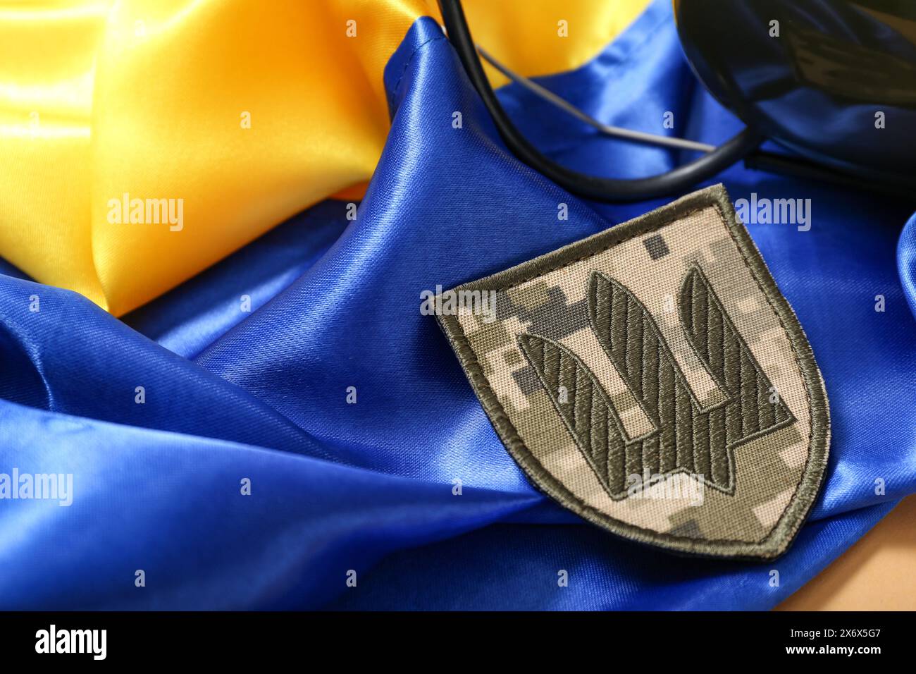 Badge of Ukrainian army with trident on Ukraine flag, closeup Stock ...