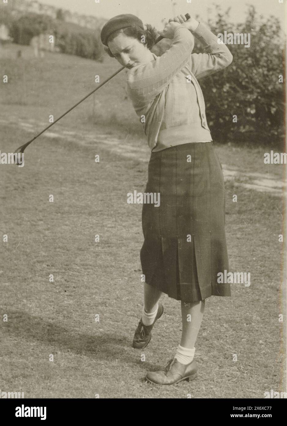 Sheila Fisher , woman golfer swinging wood club. Vintage Archive ...