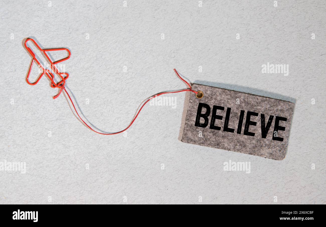 Business and Economics. On a red background, there are clothespins and ...