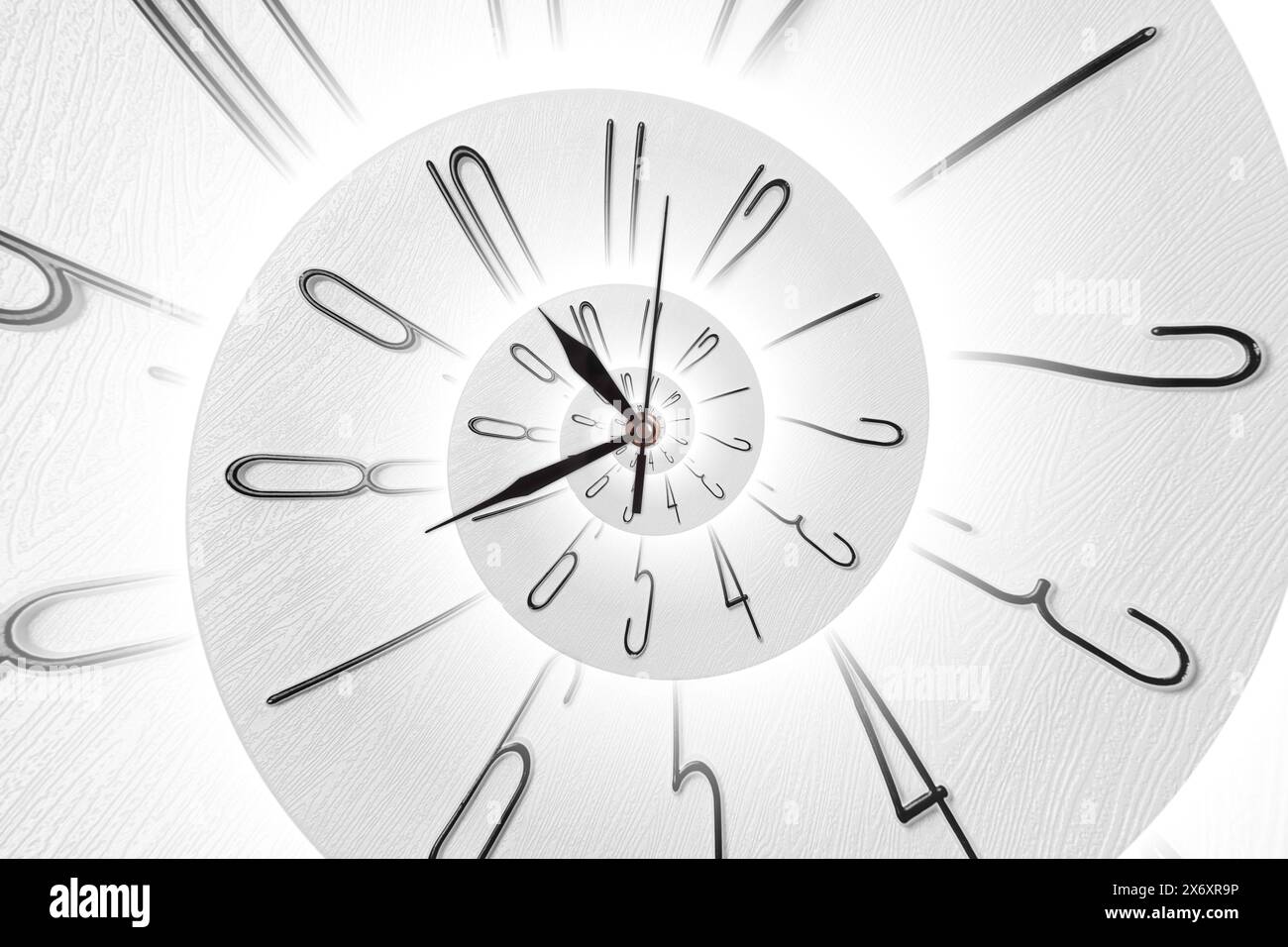 Infinity and other time related concepts. White clock face twisted in ...