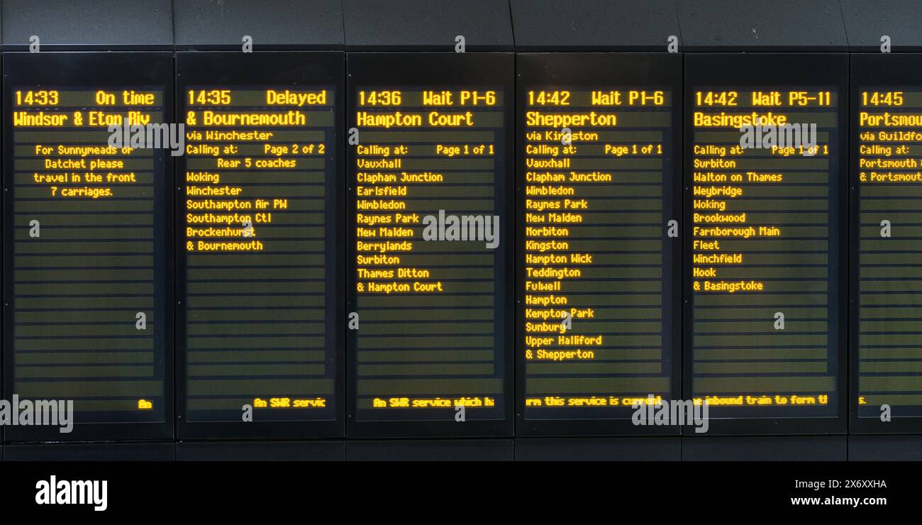 London, UK - March 22, 2024; Electronic departure board detail of train ...