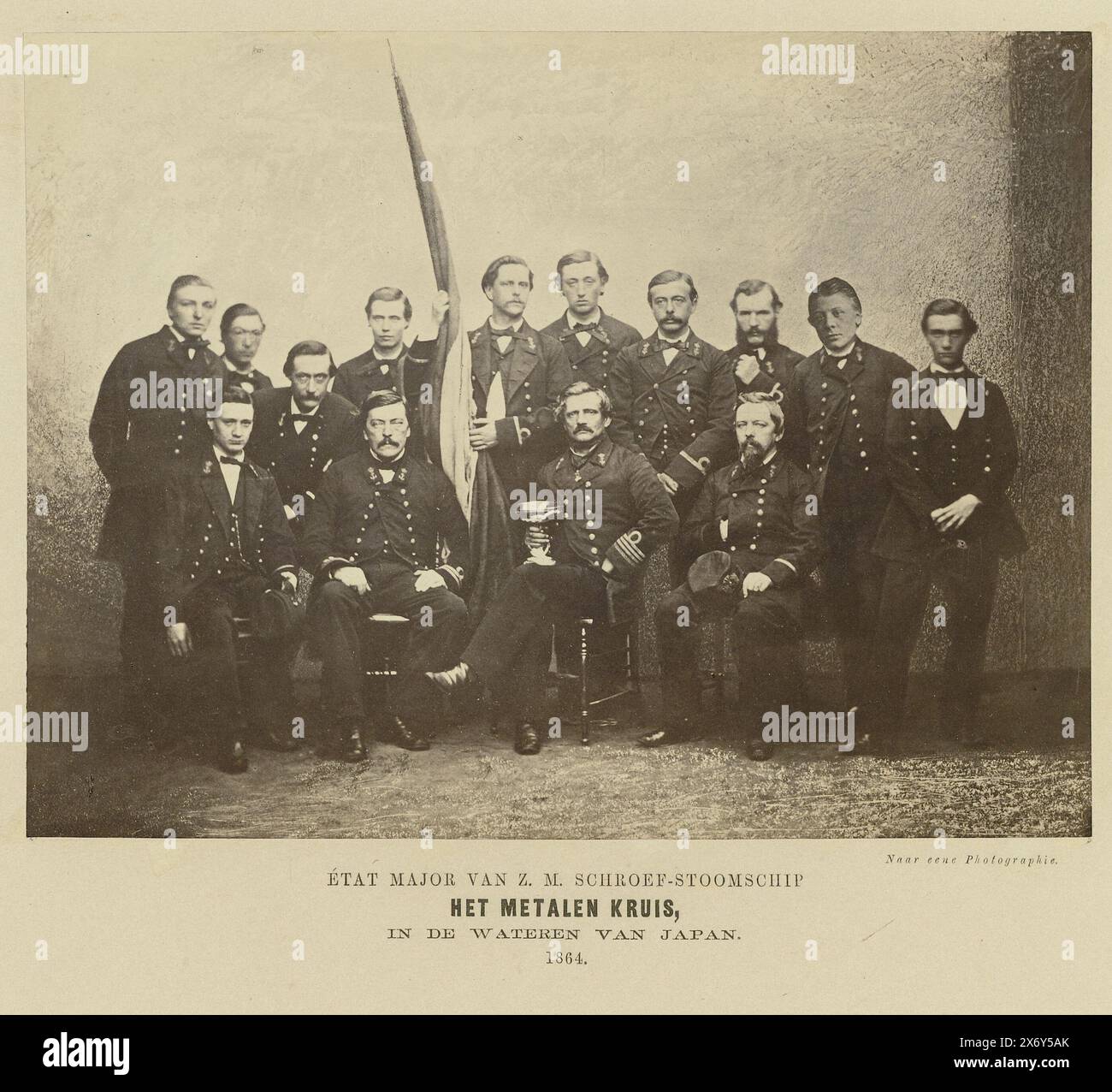 Group portrait of 14 officers (including J.W. Binkes) of the ship Het ...
