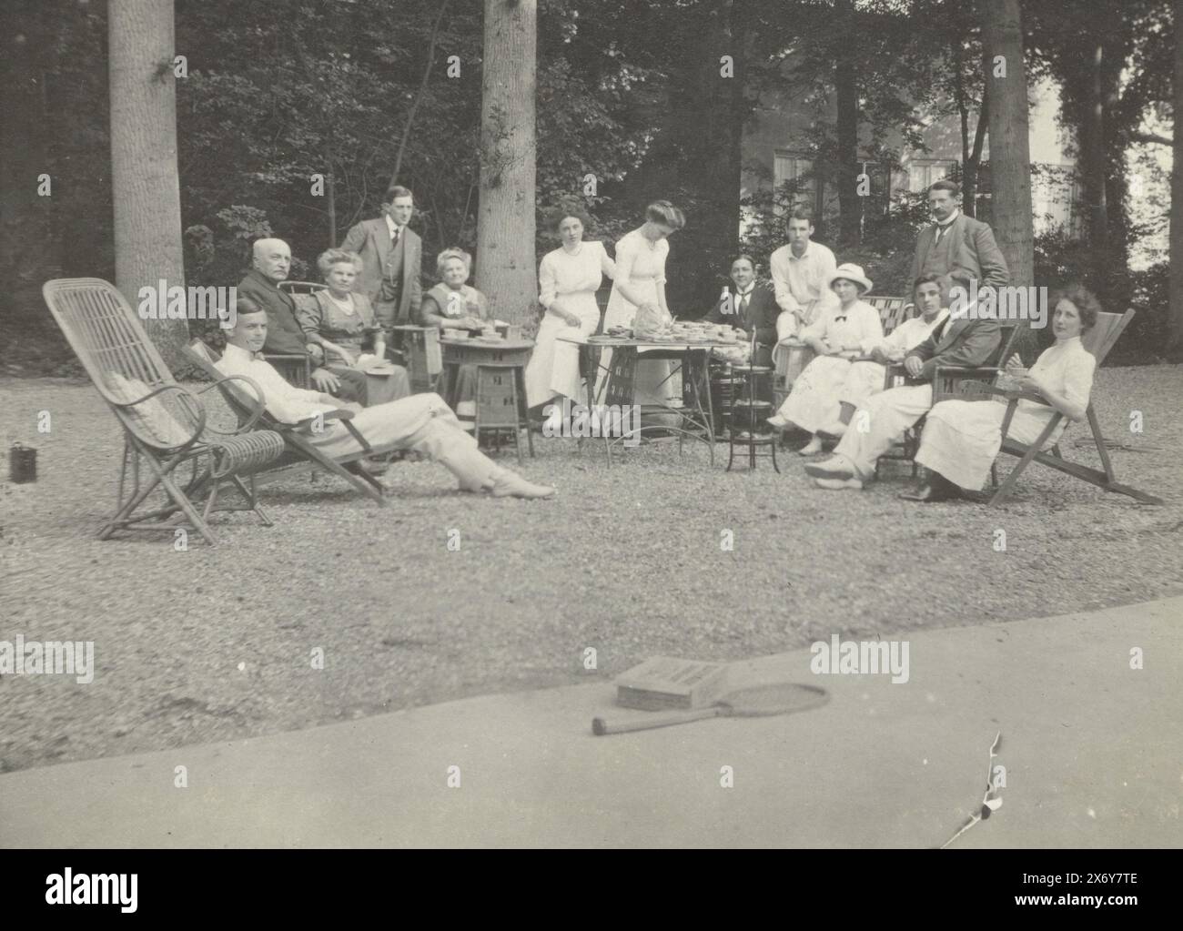 Group portrait of the Kessler family at an outdoor table during a cup ...