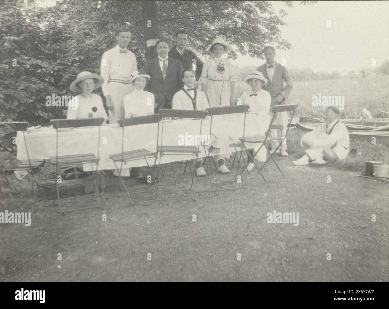 Group portrait of the Kessler family at an outdoor table, photograph ...