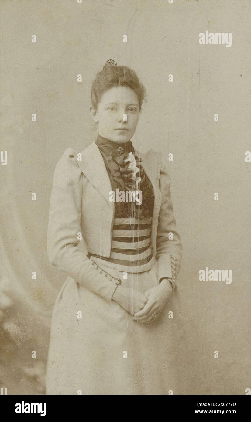 Studio portrait of a woman in a skirt and jacket with puffed sleeves, carte-de-visite, Albert ...