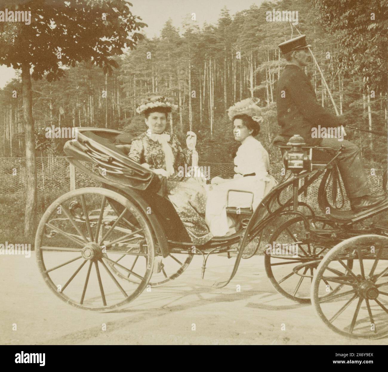 Two women in a carriage, Philippsbourg (Moselle), France, Two women in ...