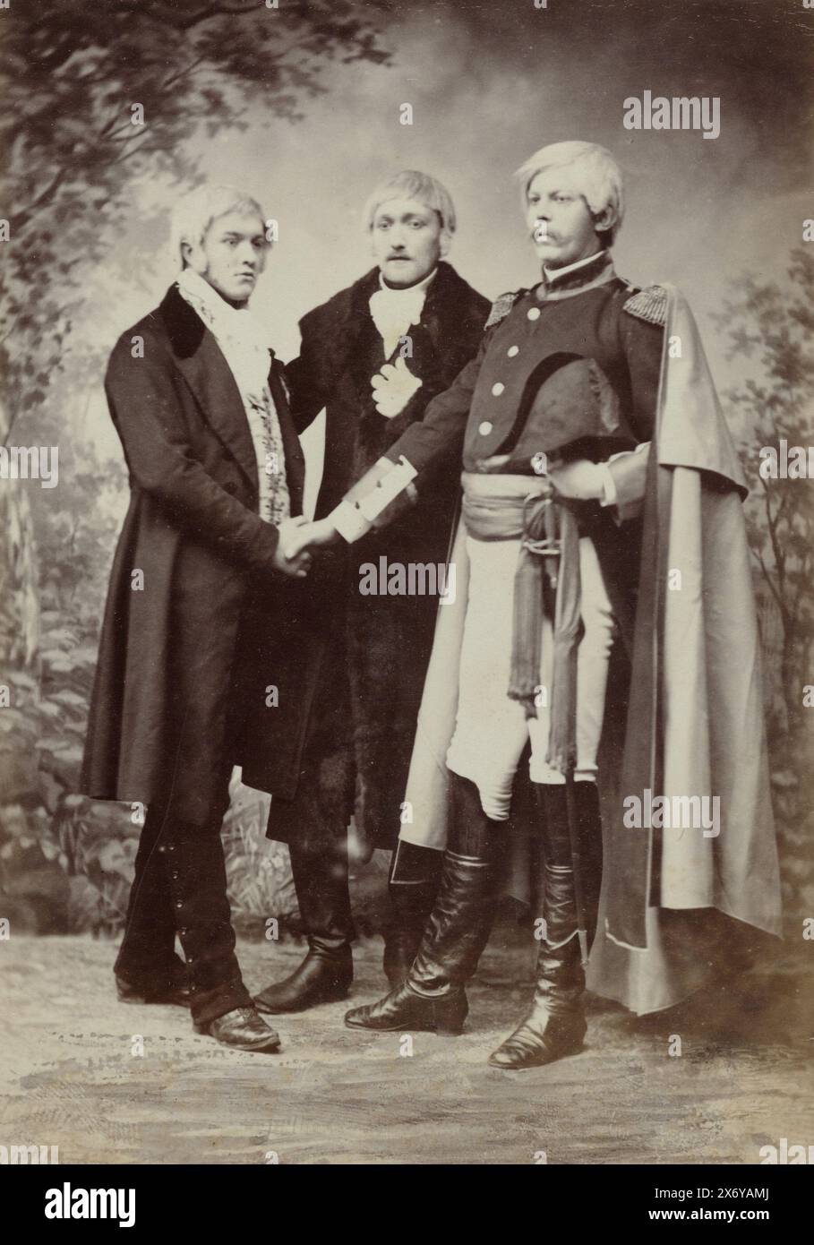 Group portrait of three unknown men in historic military uniforms and ...