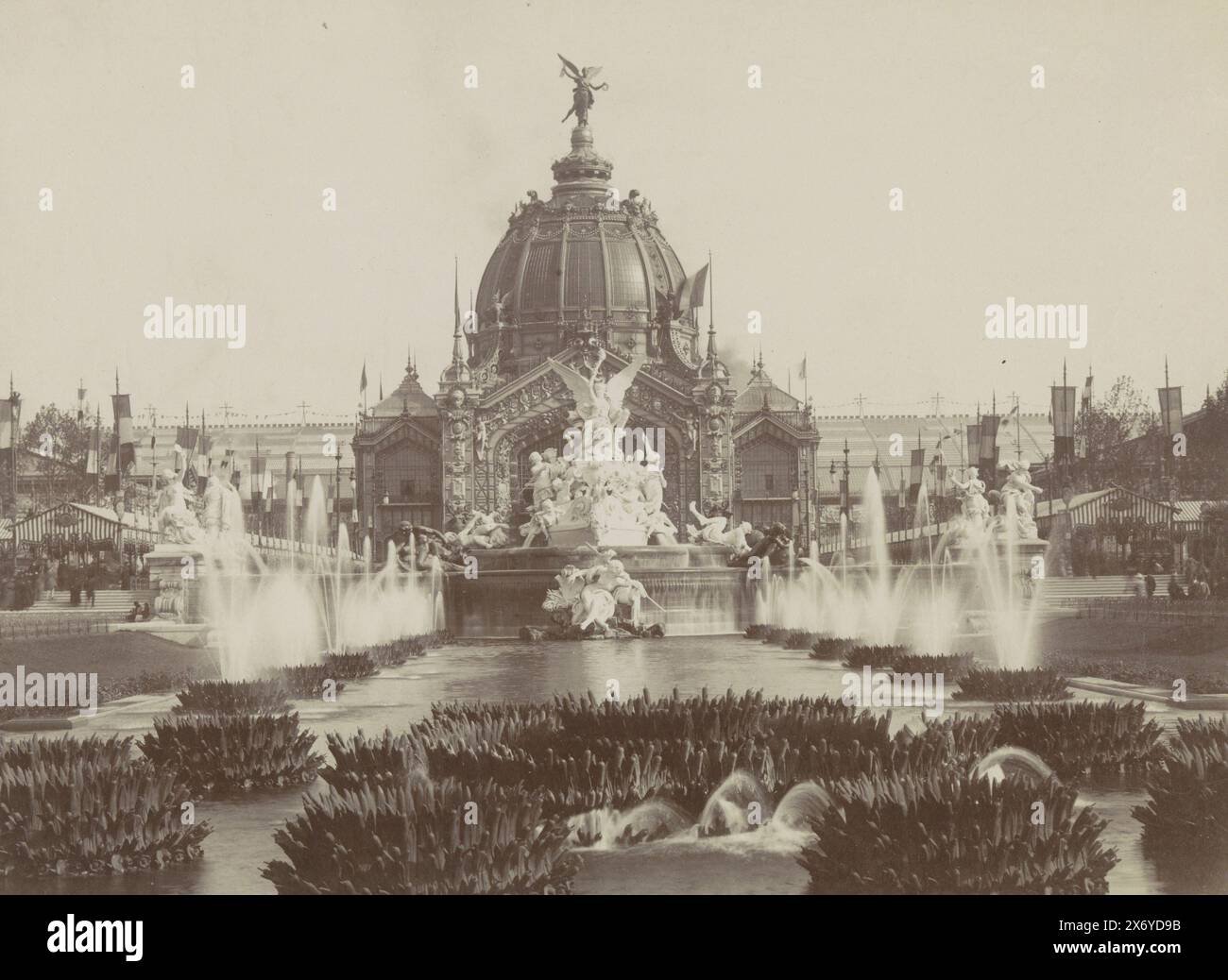 Illuminated fountain and the Palais des Industries on the grounds of ...