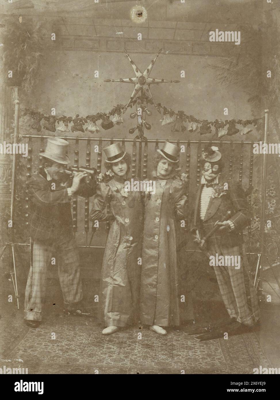 Two clowns and two women in circus costumes, cabinet photograph ...