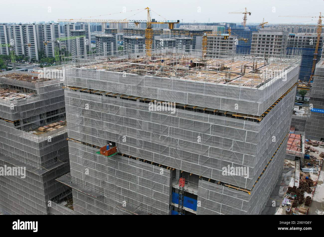 HANGZHOU, CHINA - MAY 17, 2024 - A new building is under construction ...