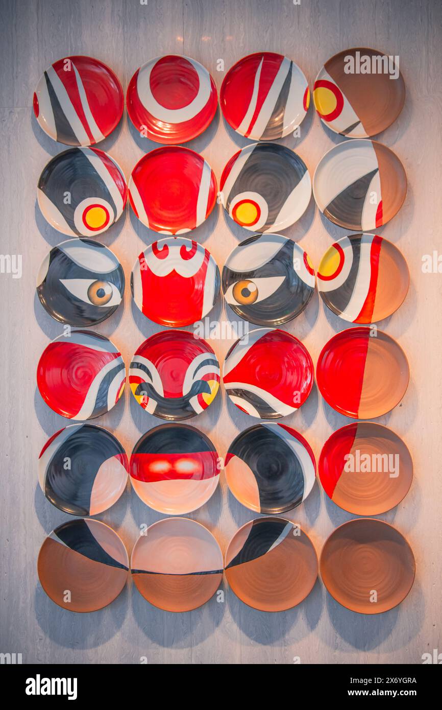 The Sichuan opera mask made out of colorful plates in Chongqing, China ...