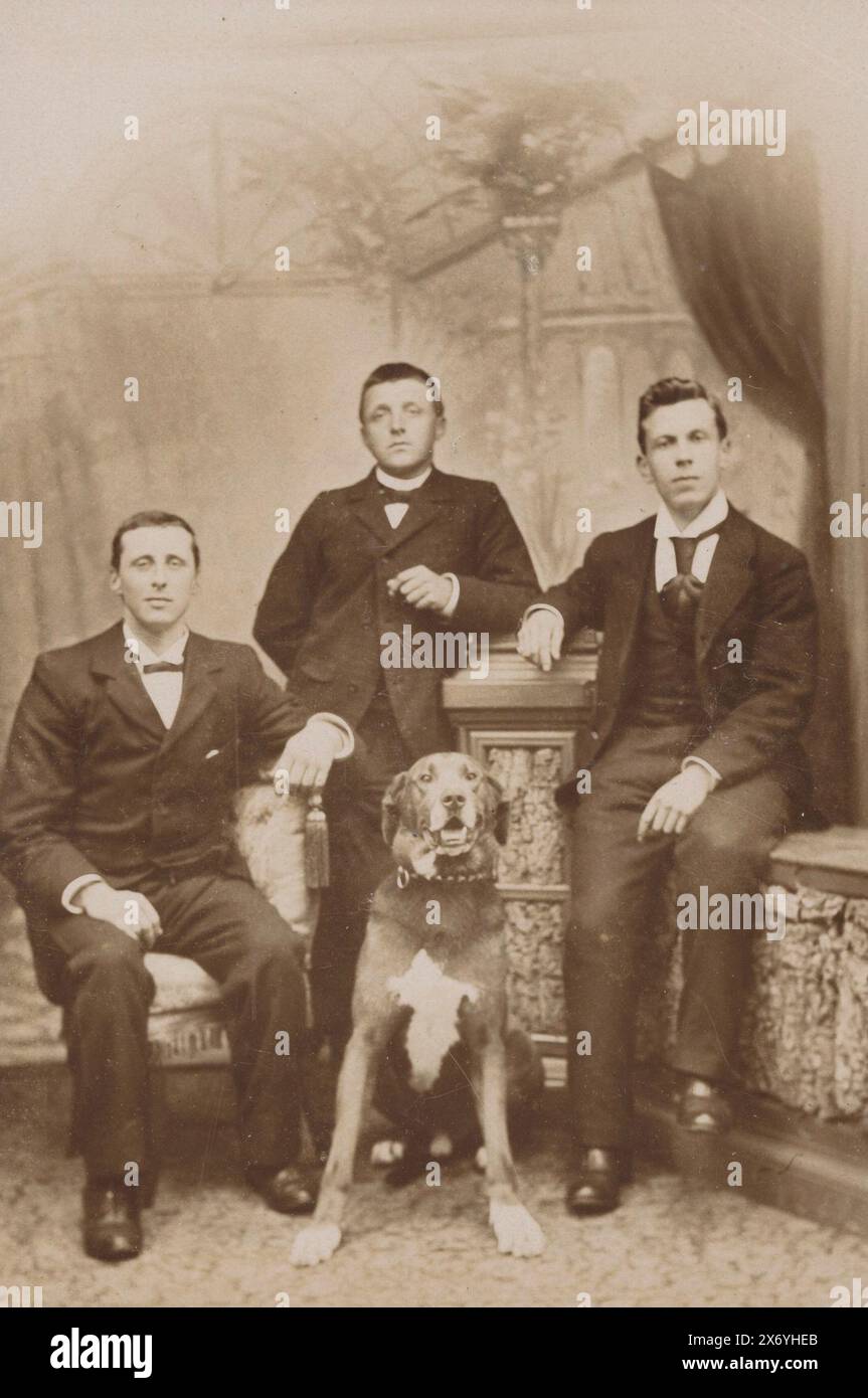 Portrait of three unknown men and a dog, cabinet photograph, Albert ...