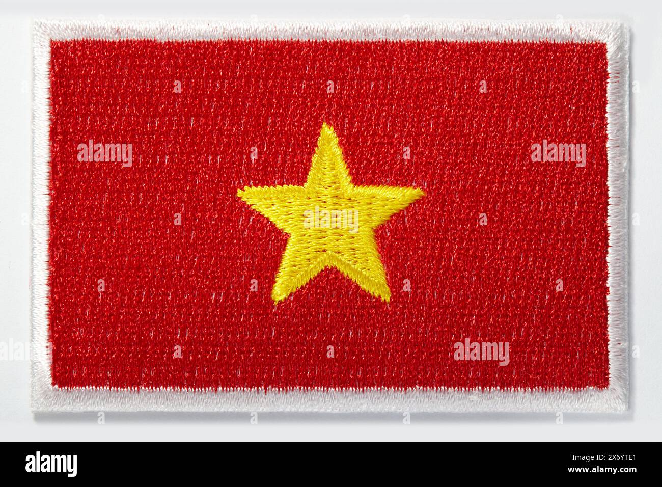 Embroidered emblem of the Vietnamese national flag with one yellow star ...