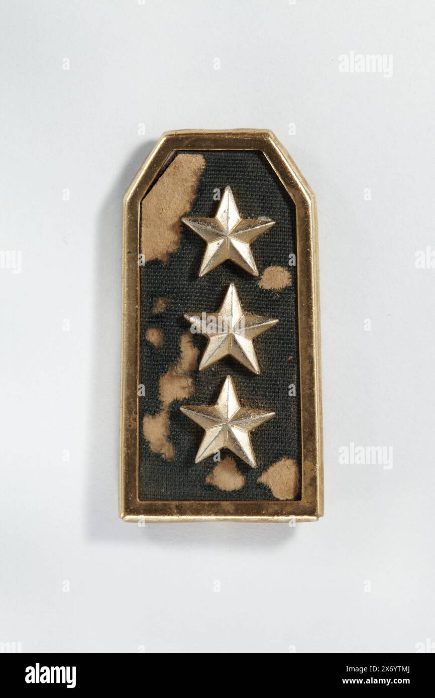 shabby and unkempt three star pin as a badge of rank in the military on ...